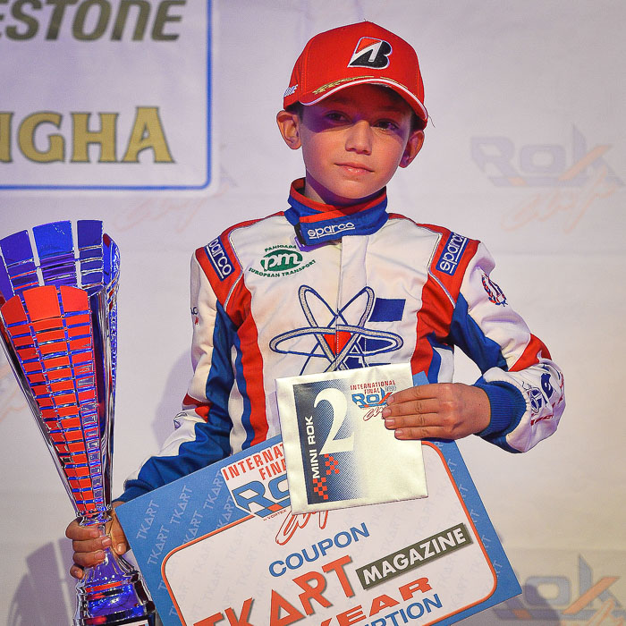 Alex Powell on the podium of the Rok Cup International Final